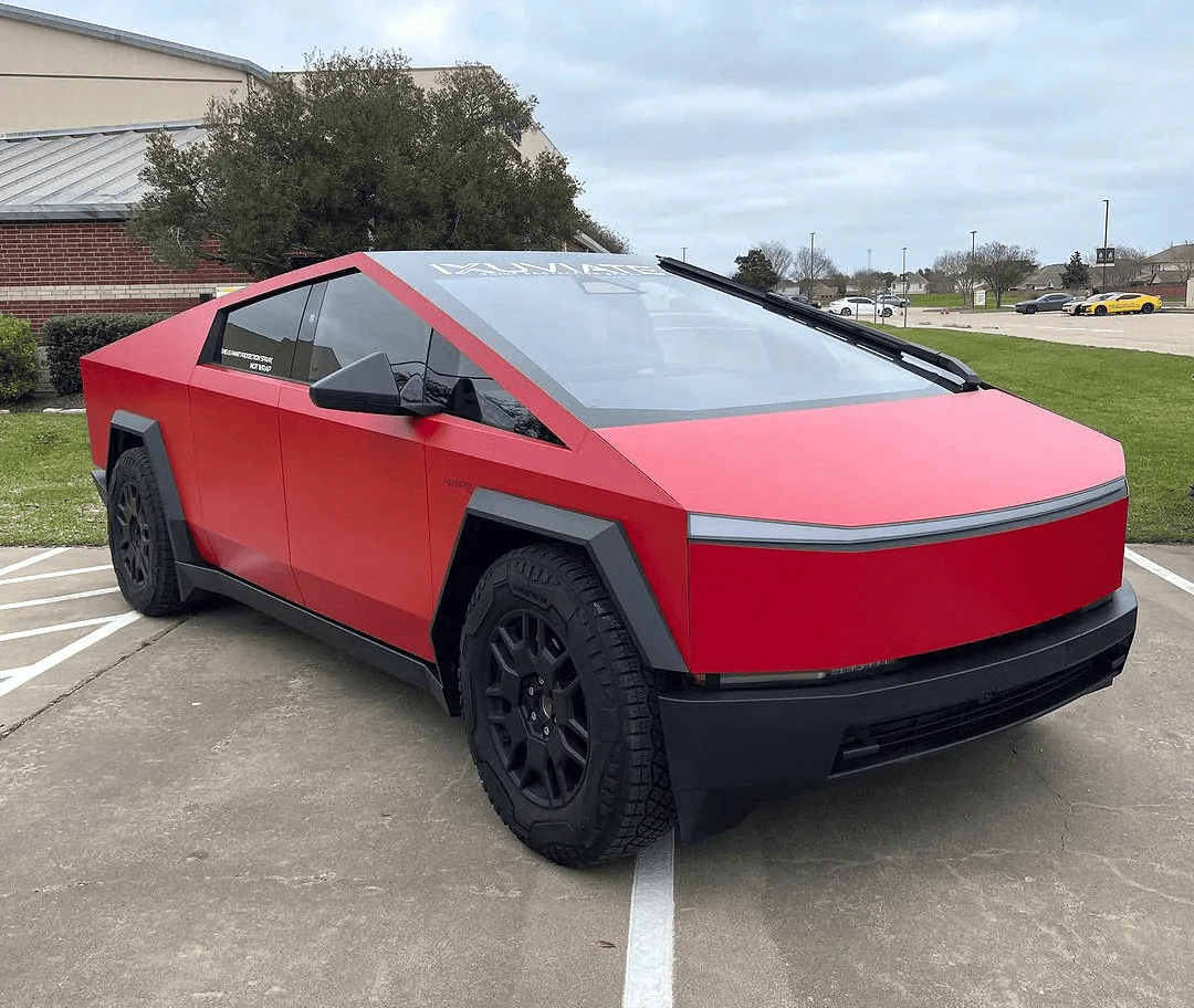 First liquid PPF "painted" Cybertruck in Rosso Ferrari Red | Tesla ...
