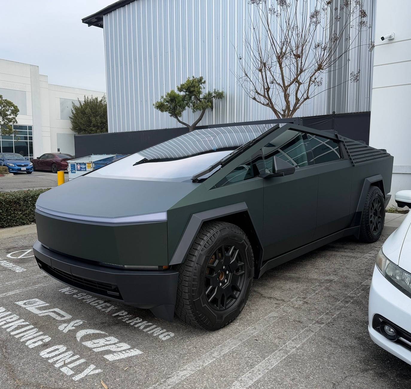 Customer Cybertruck in PURE PPF Forest Green Wrap, Gyeon Ceramic Coat ...