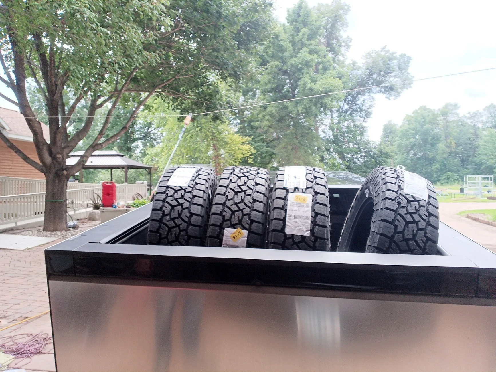 How to fit 36" tires (35.7) on stock wheels without rubbing. | Tesla ...