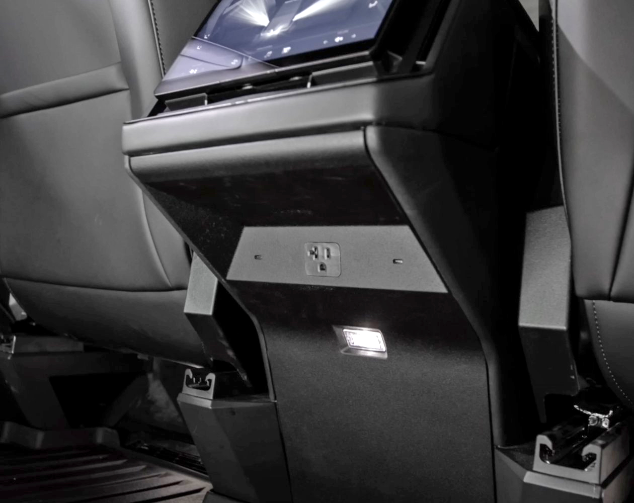 Rear Seat 120v Outlet and Console Photo Tesla Cybertruck Forum Cybertruck Owners Club